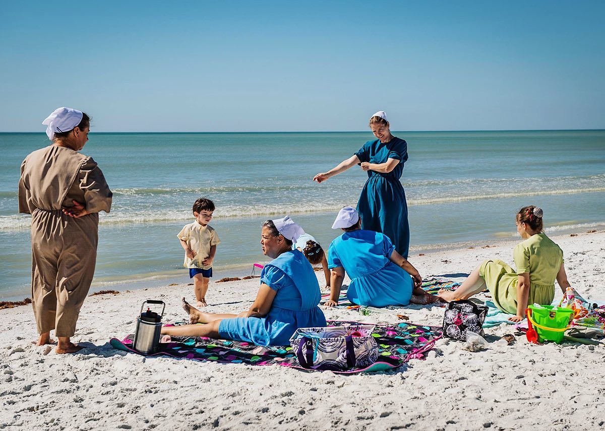 A beautiful image of Amish family in the beach of Pinecraft
