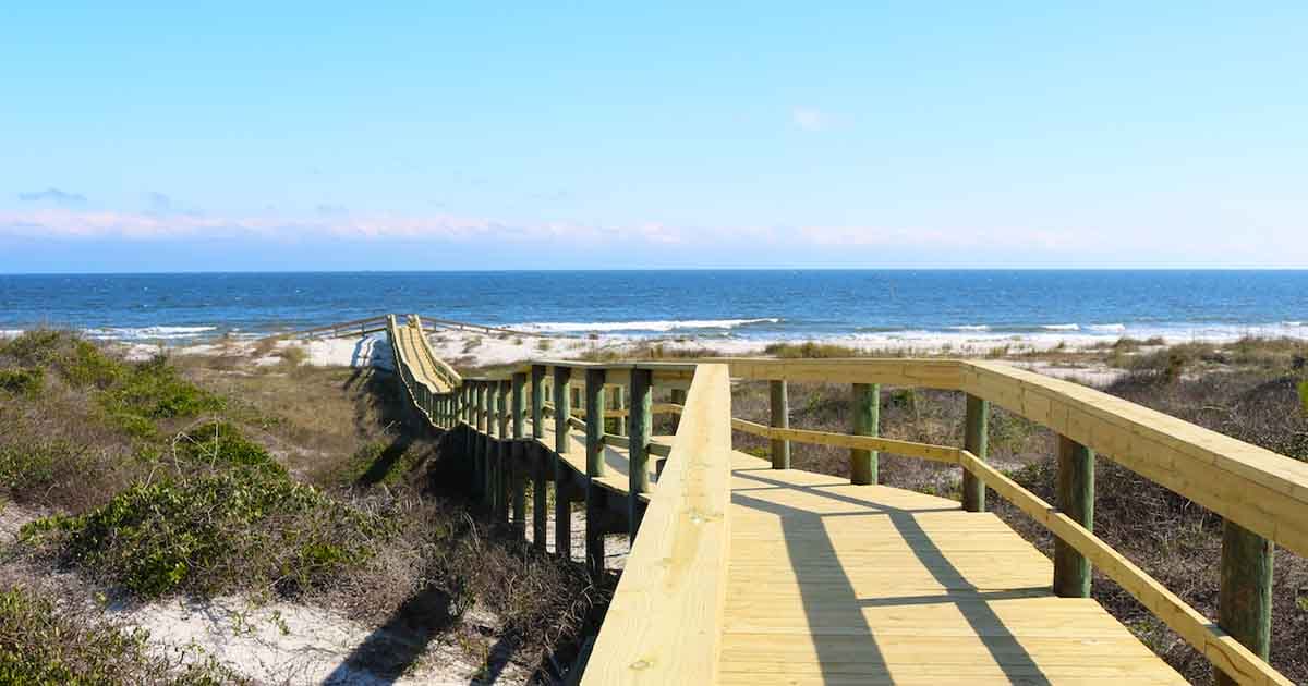 A boardwalk thet leads to a spectacular beach
