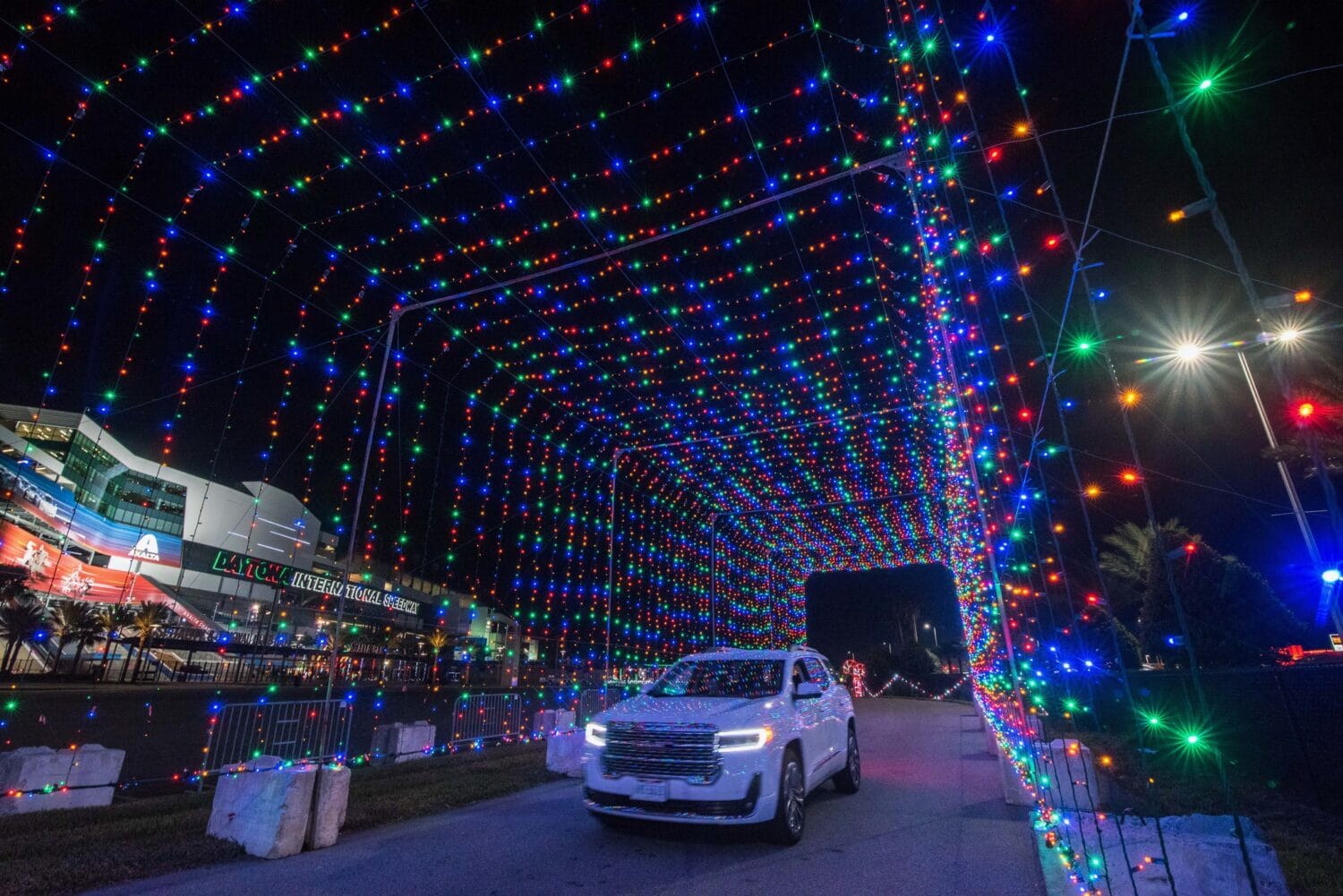 A car passing through the illuminated highway in Daytona
