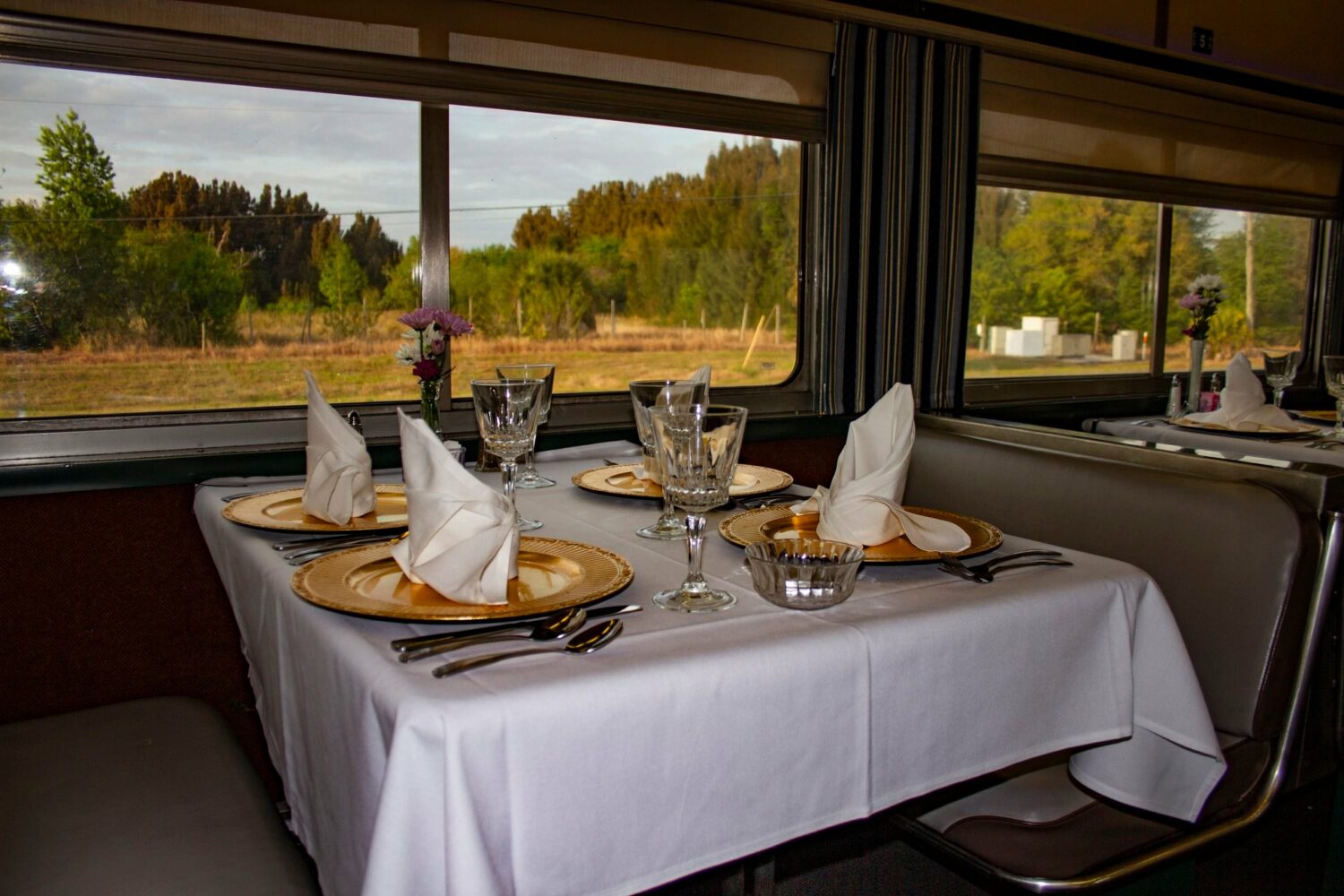 An elegant table set up inside the train.