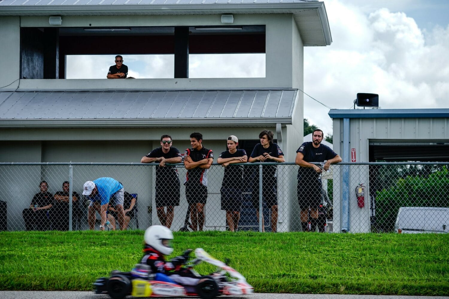 An image of the bystanders watching a race