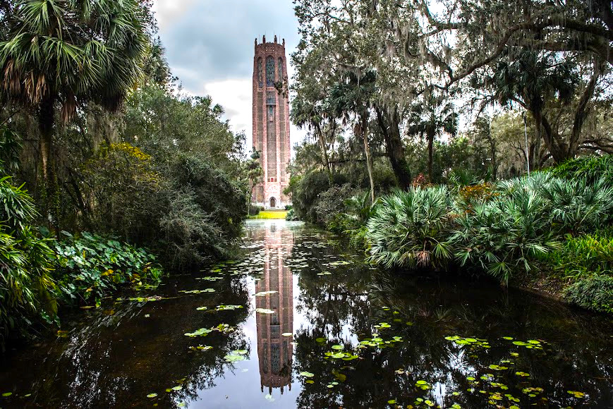 bok tower reflecting in the cool water