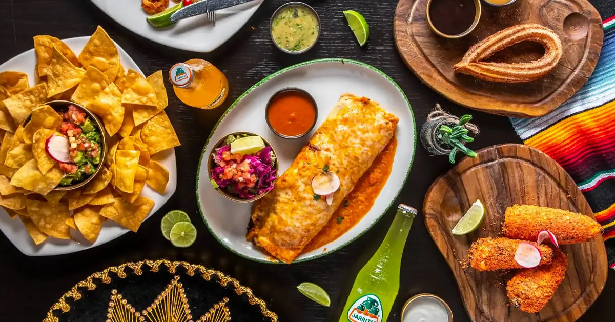 A table full of delicious Mexican dishes