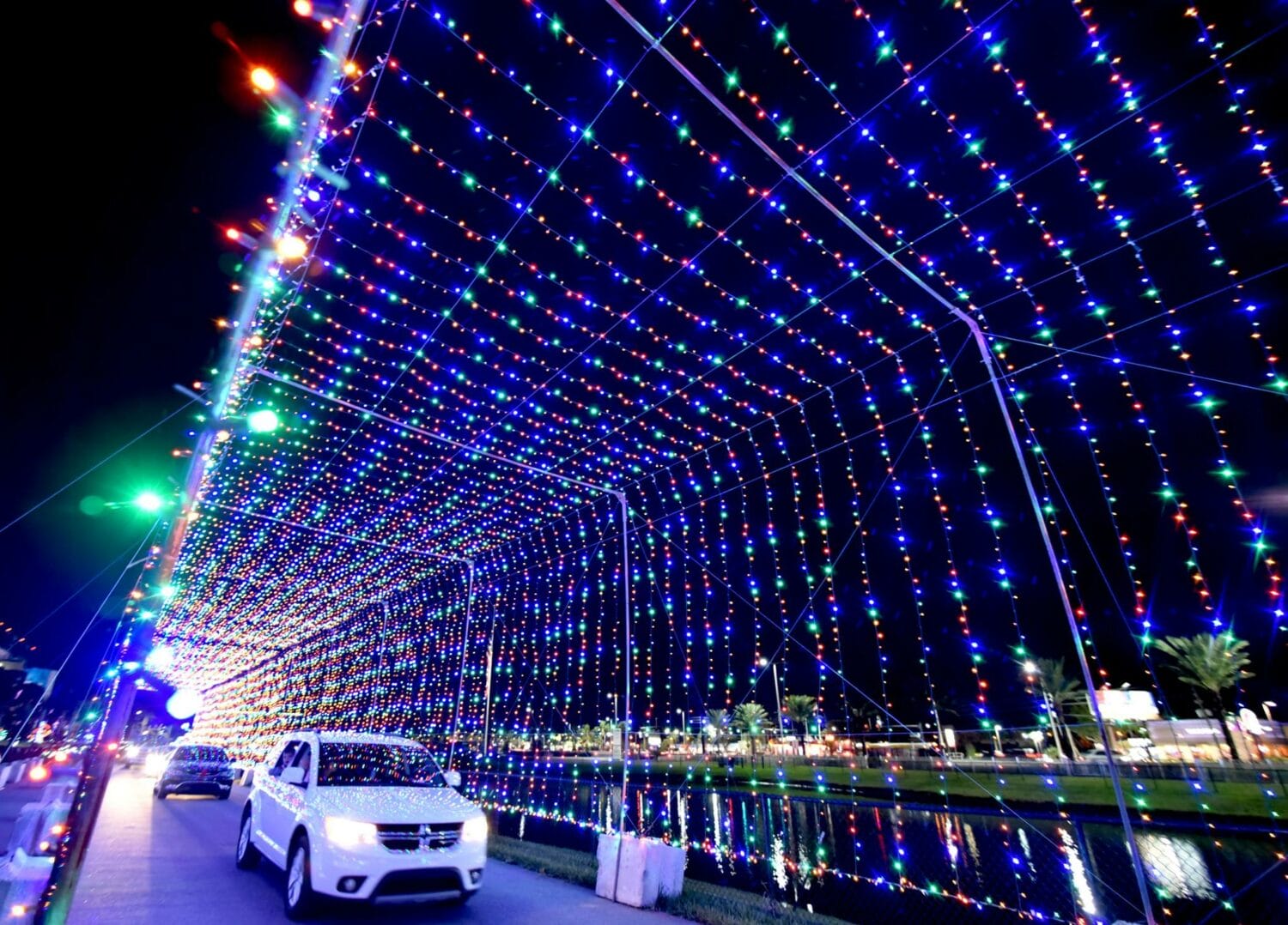 A car passing through dazzling holiday light
