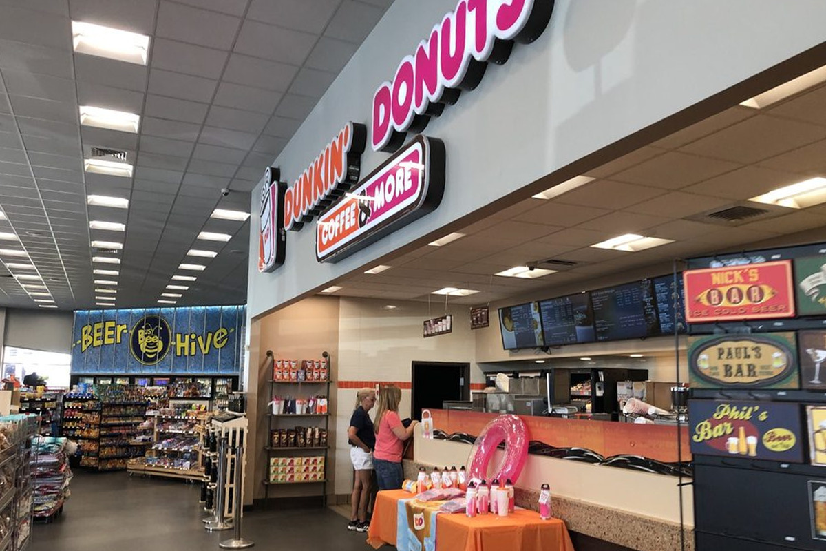 pople buying at dunkin donut shop inside the busy bee