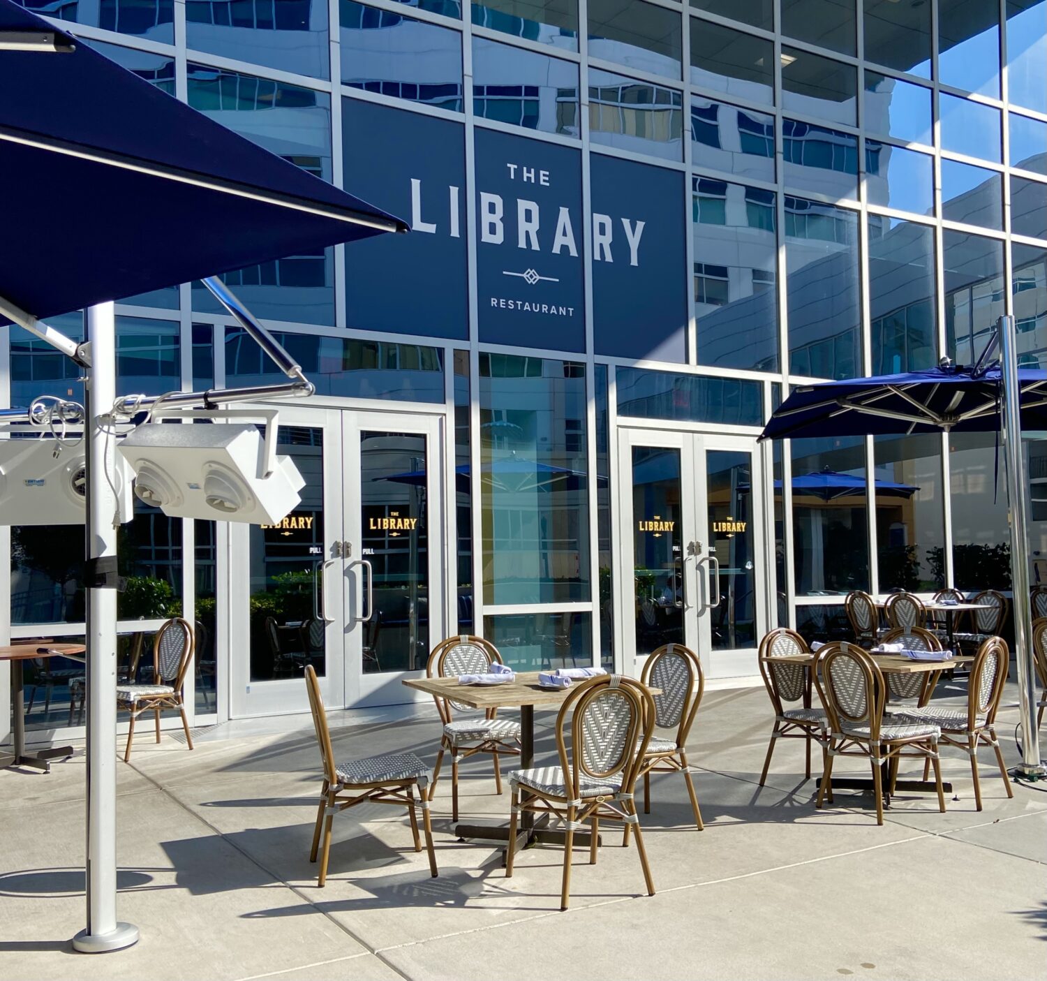 The exterior of the The Library Restaurant with outdoor sitting