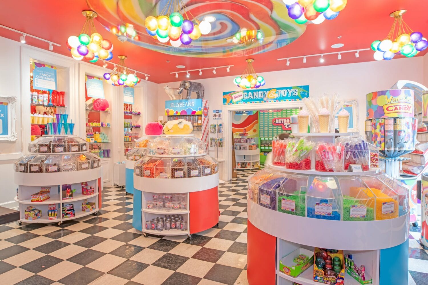The inside of the store with various displays of candies.
