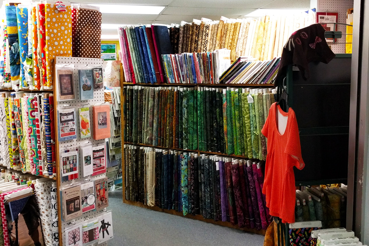 The inside view of the warehouse with a wide selection of fabrics.