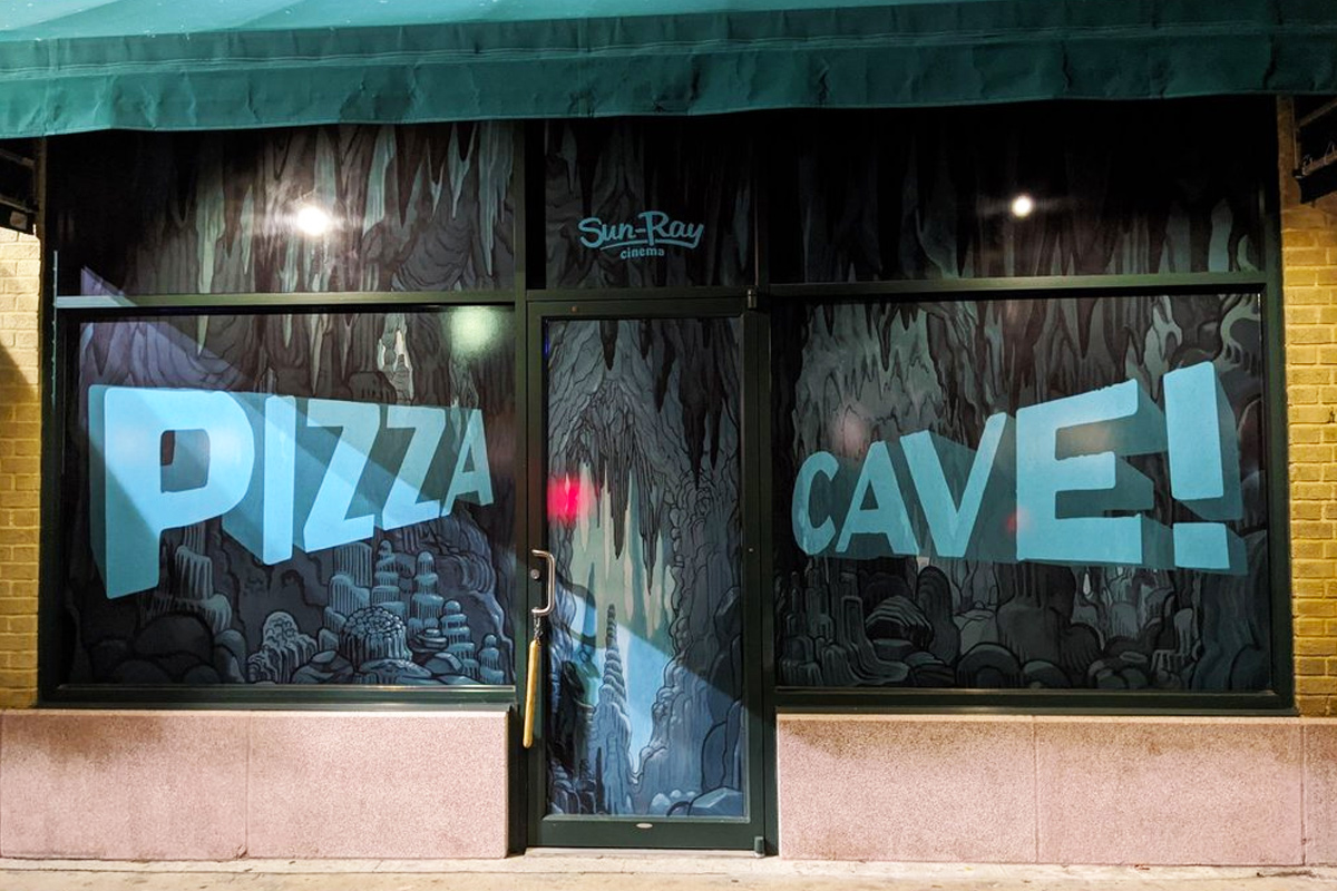 The outside of the Pizza Cave.