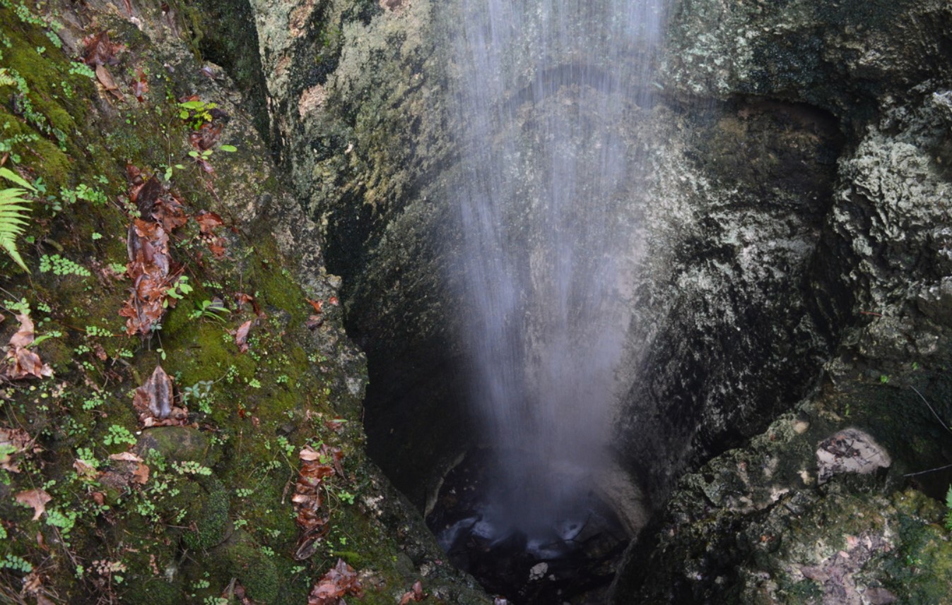 the sinkhole and waterfall of the park