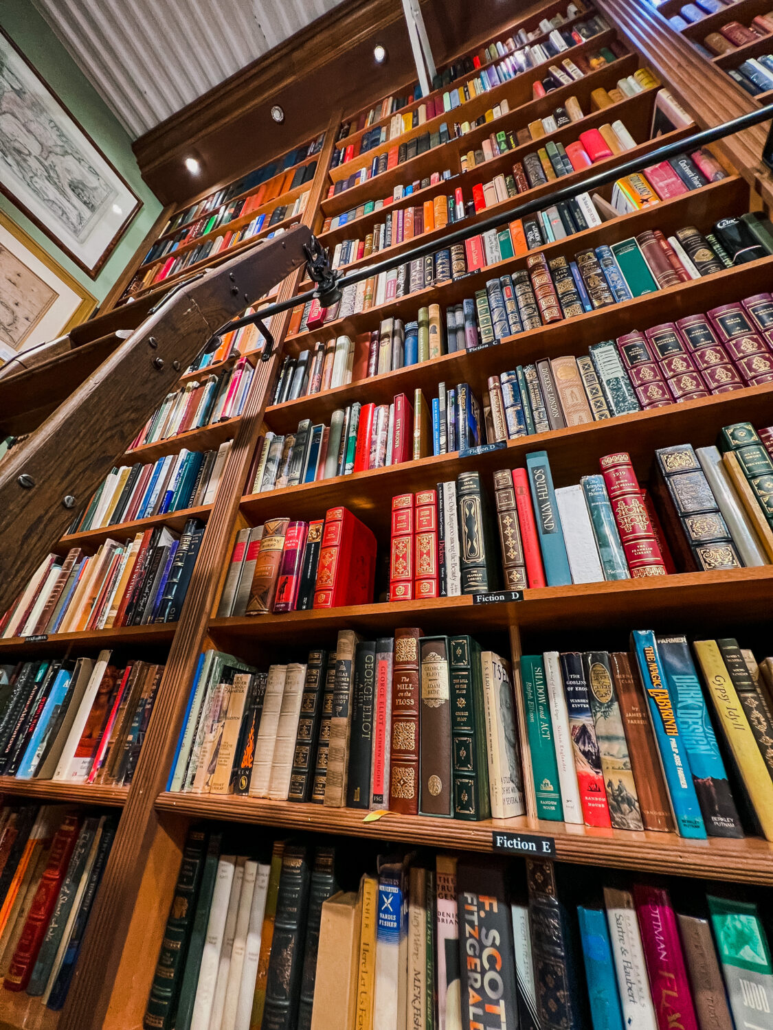 A vertical bookstore with numerous shelves of books