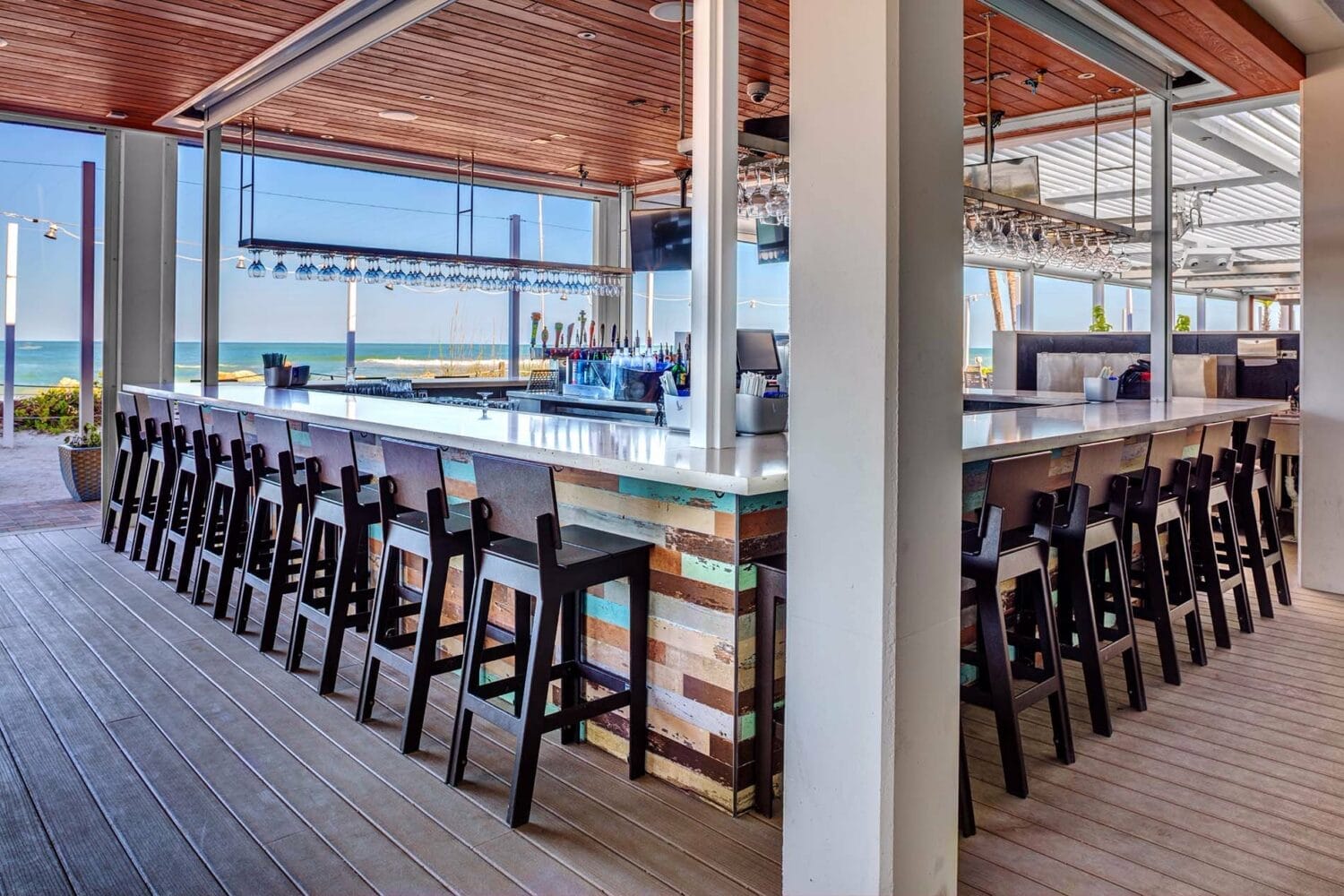 a bar that offers a scenic view of the ocean
