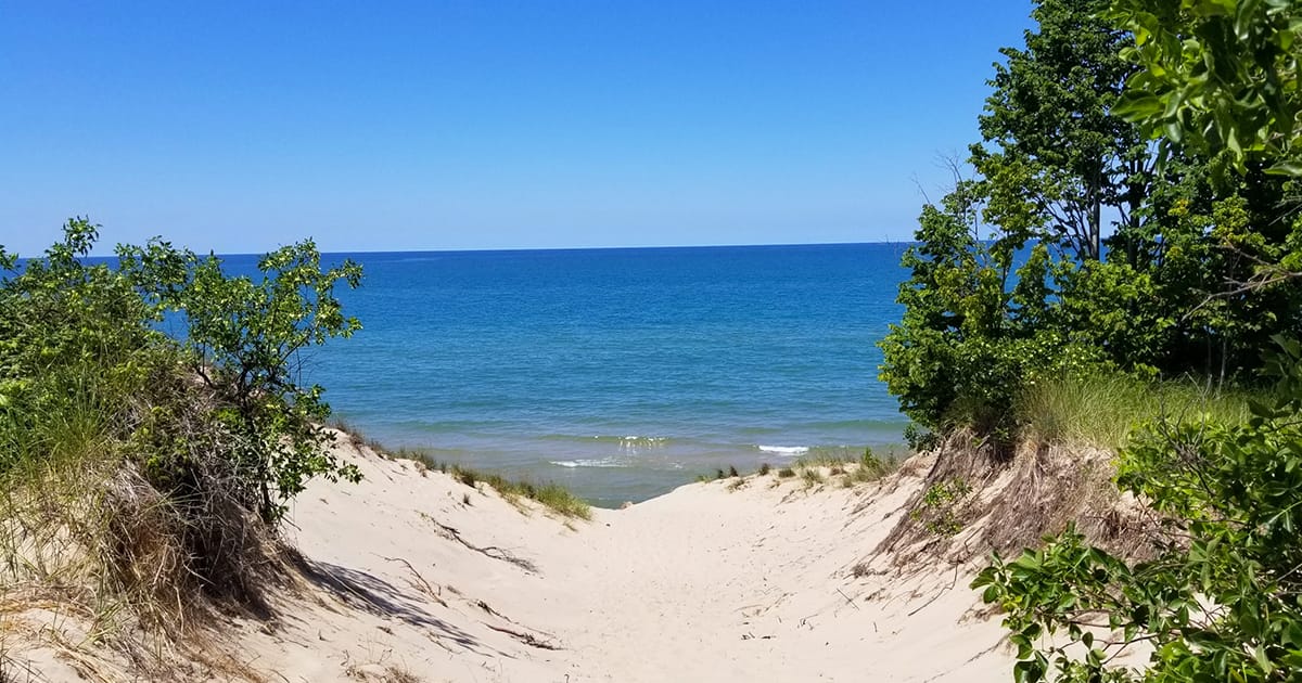 a beautiful view of the beach at grand mere state park