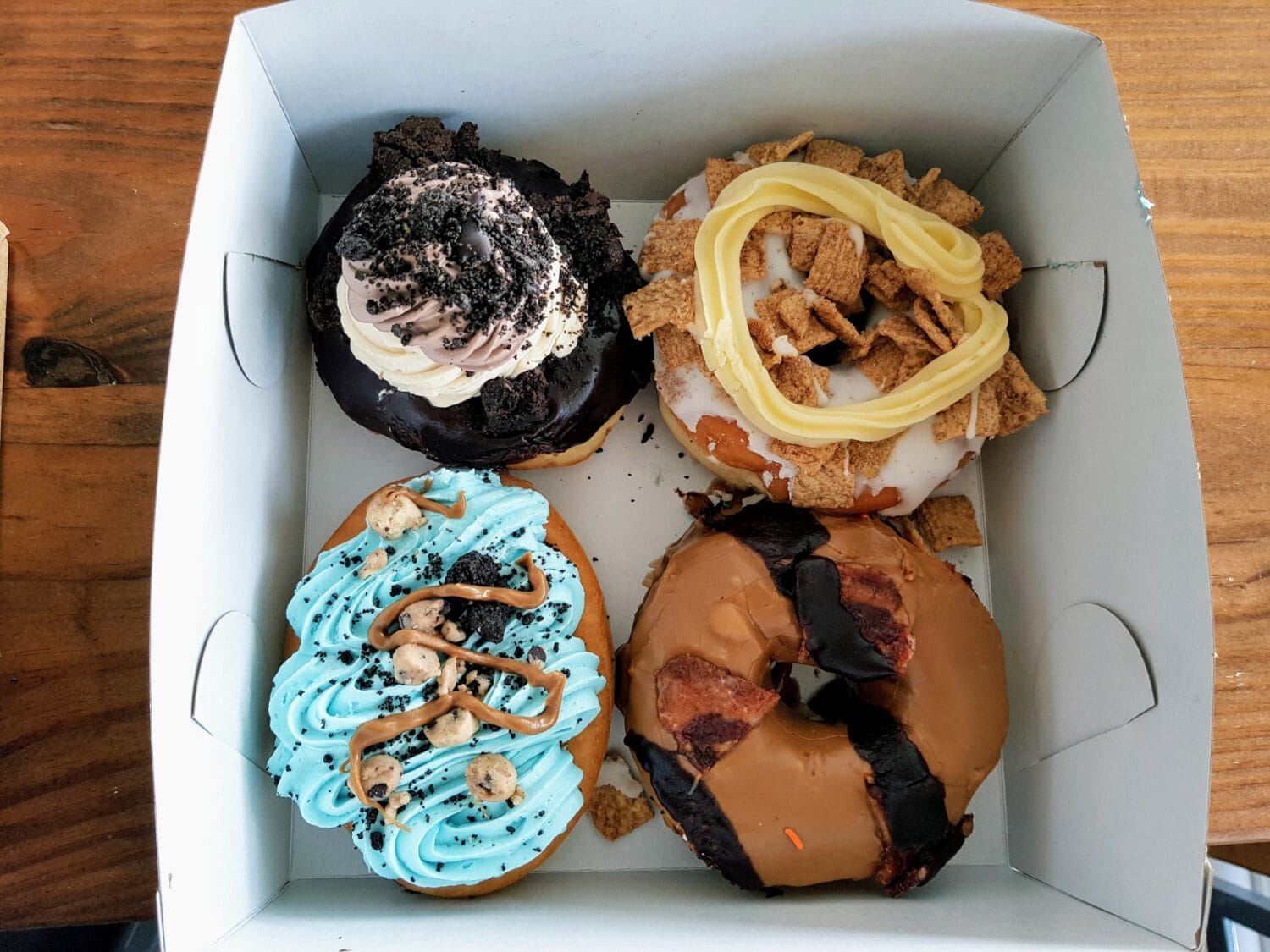 A box of differently flavored donuts