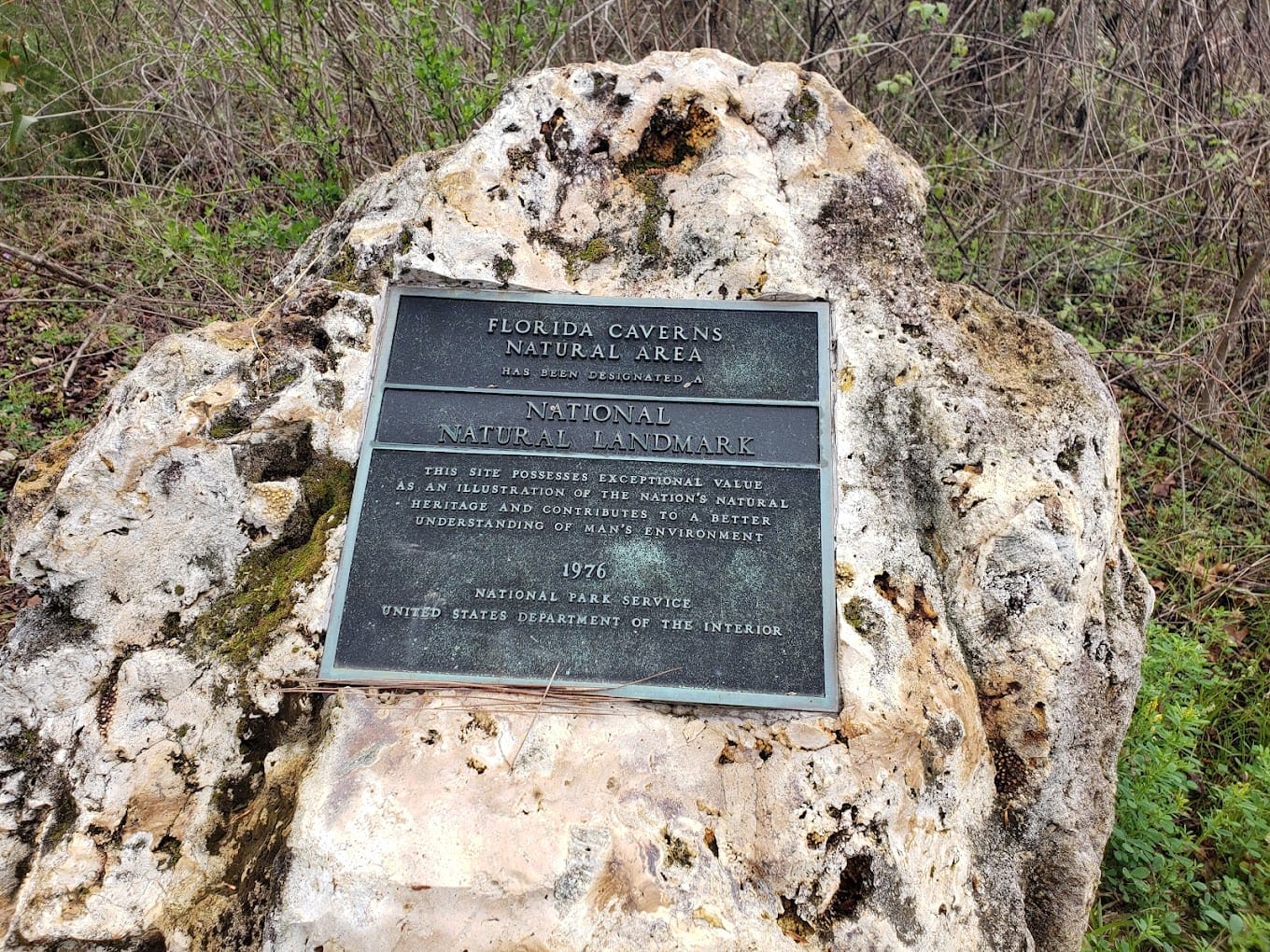 a commemorative plaque at florida caverns state park