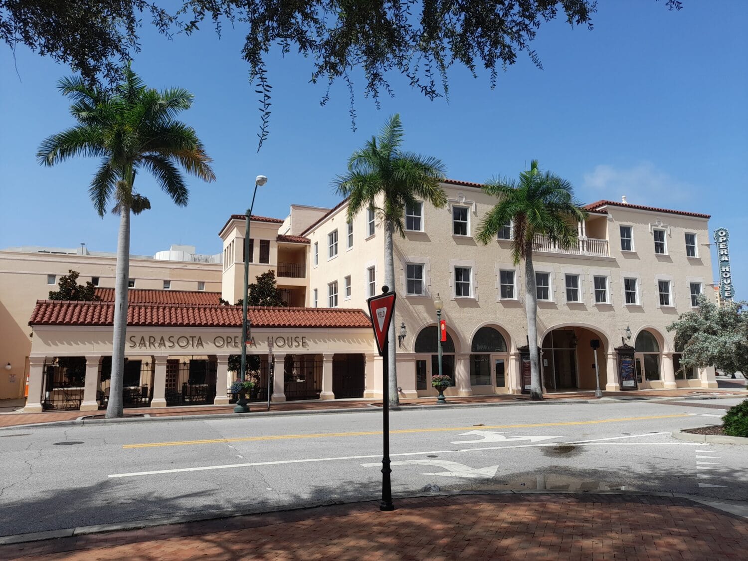 a full picture of the sarasote opera house building taken across the street