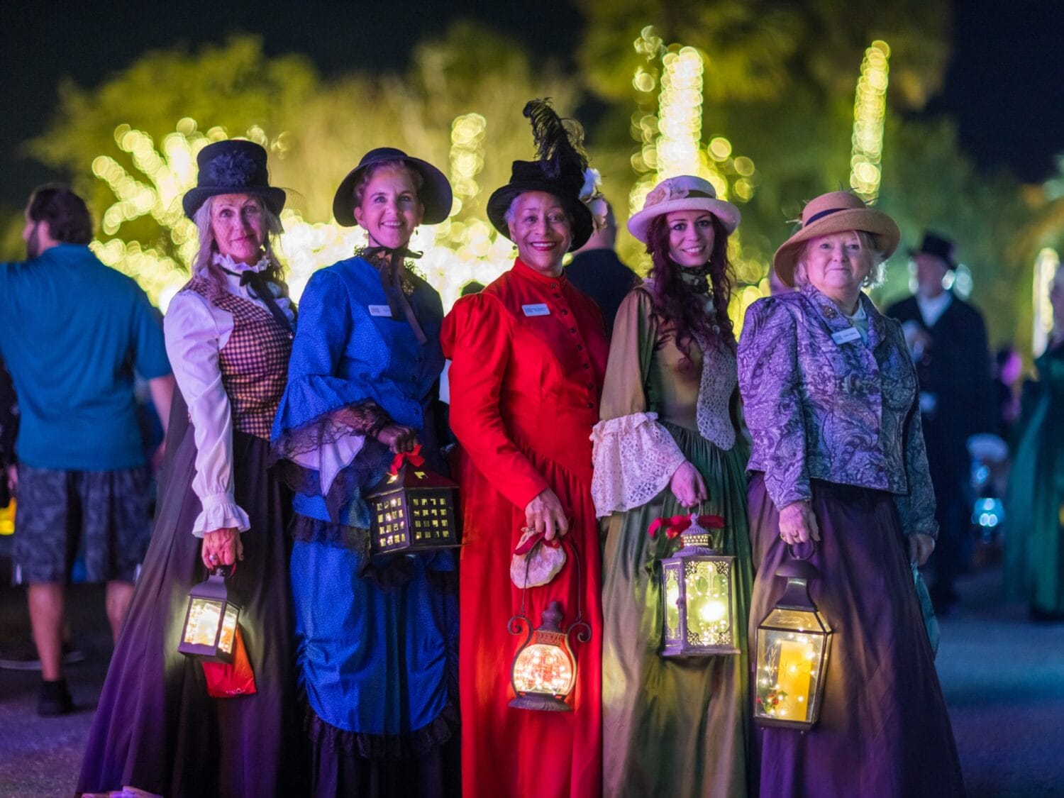 A group of people wearing Victorian dresses