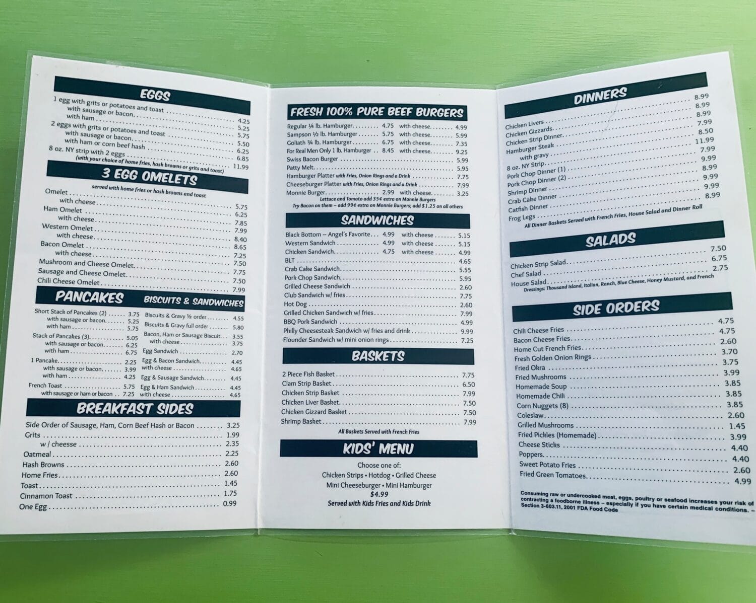 a menu from angels diner displaying a variety of classic american diner fare from breakfast items to burgers and sandwiches