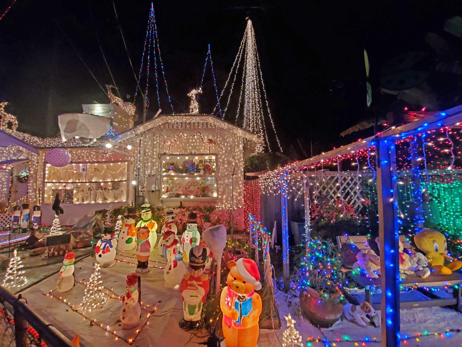 A mesmerizing display of the Oakdale Christmas house aglow with vibrant holiday decors