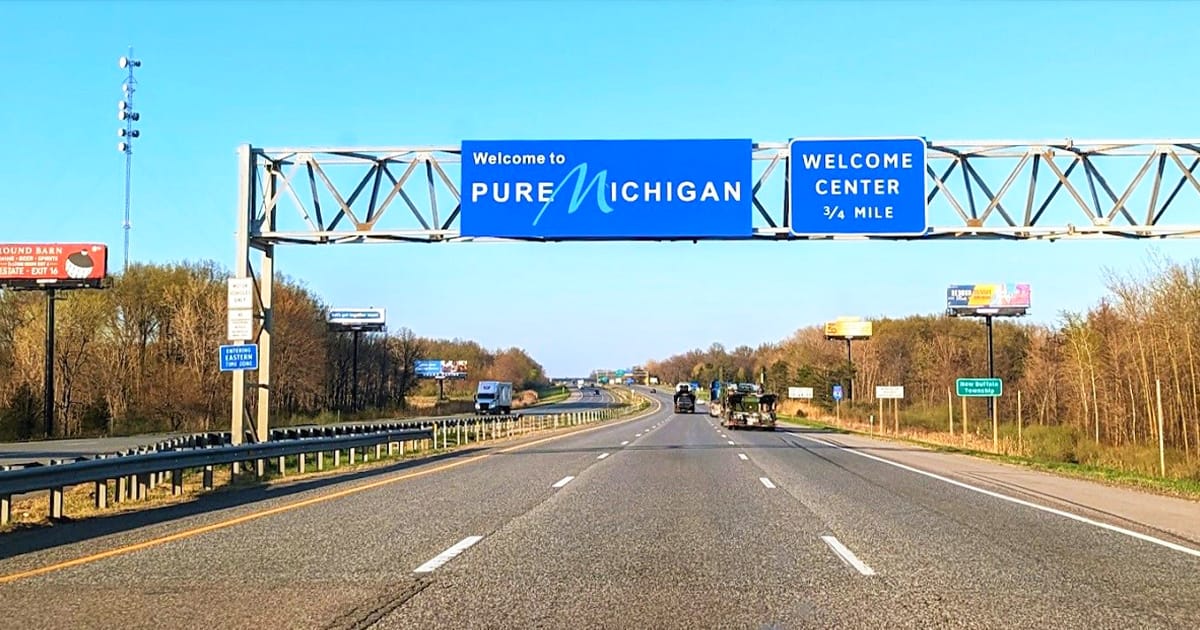 a photo of the iconic welcome to pure michigan sign