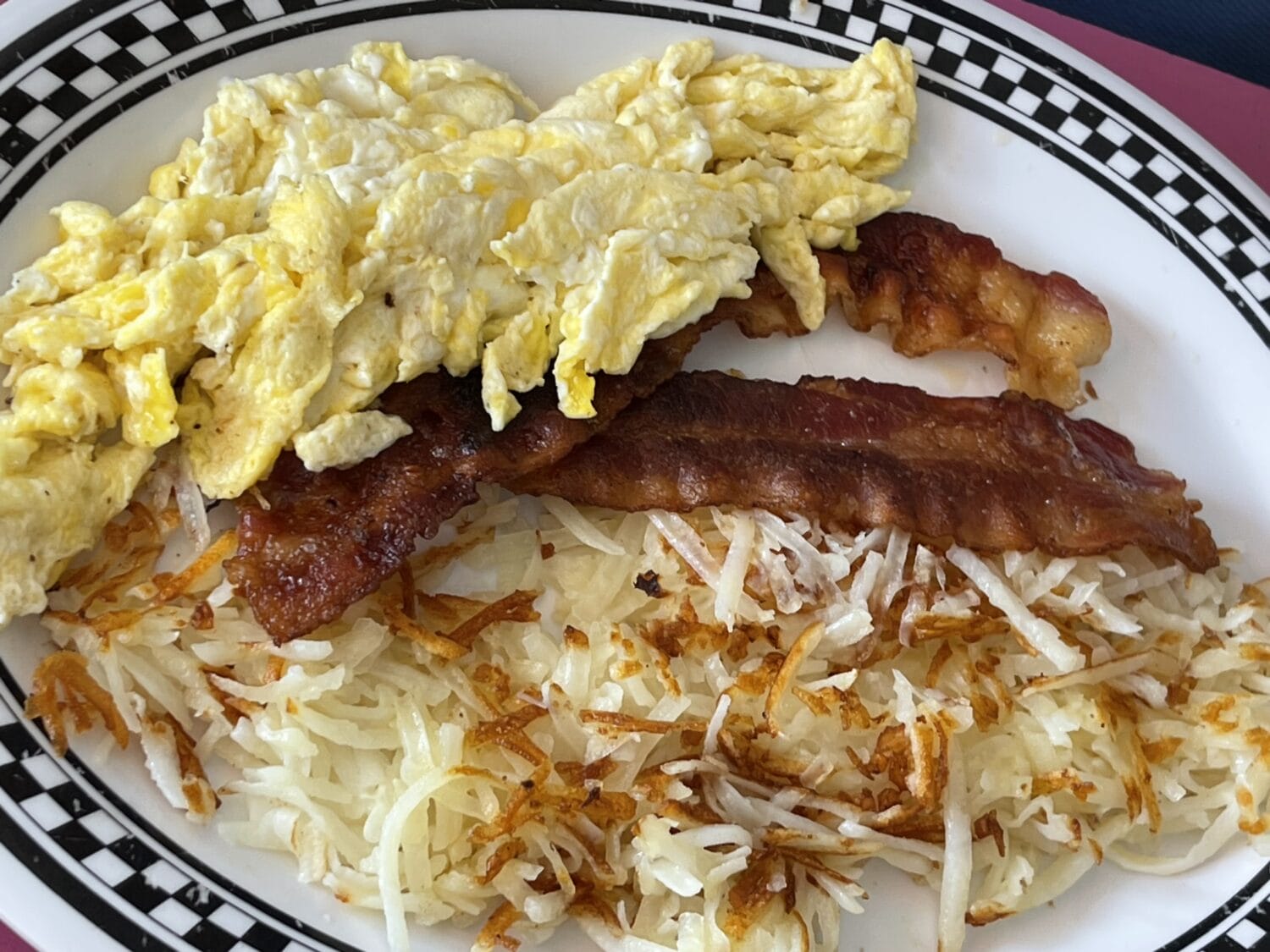 A plate of yummy breakfast foods