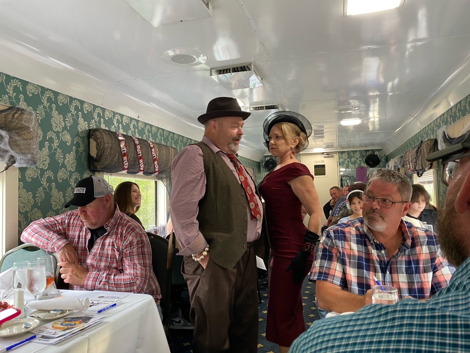 actors performing inside the train