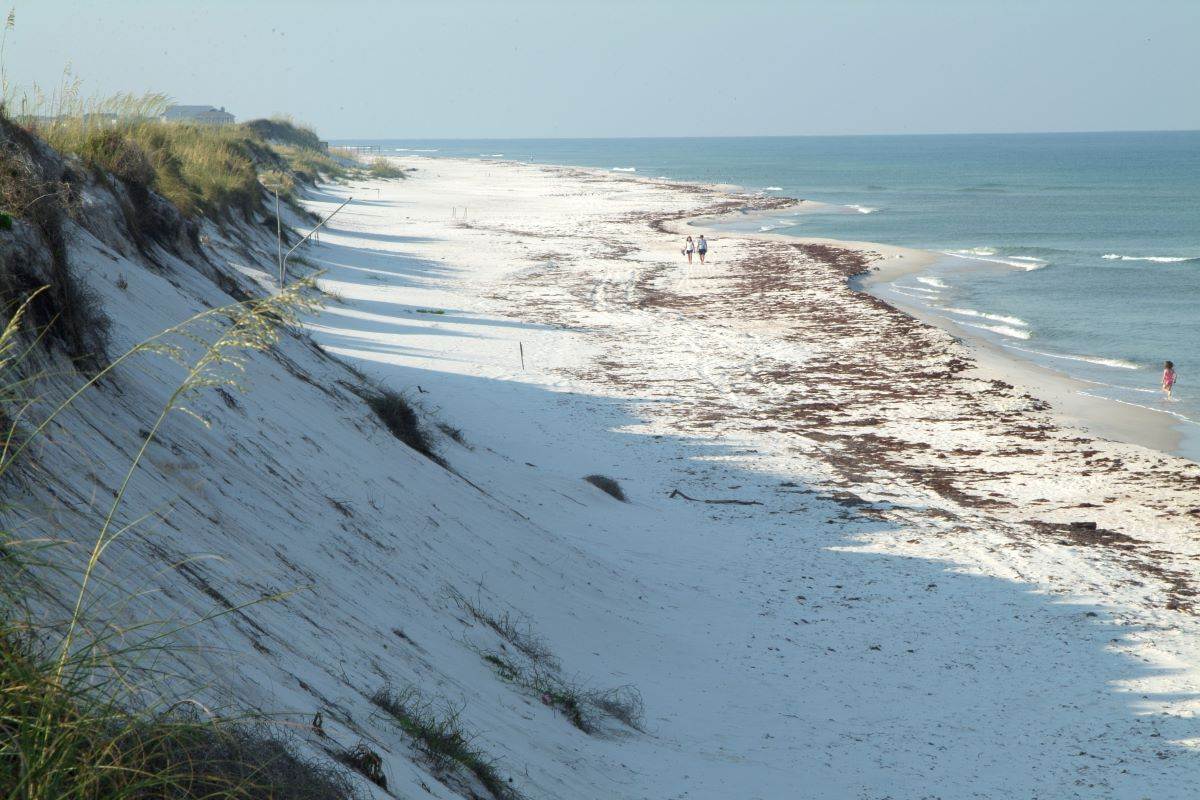 An image of St. Joseph Peninsula State Park with its powdery sand and blue waters