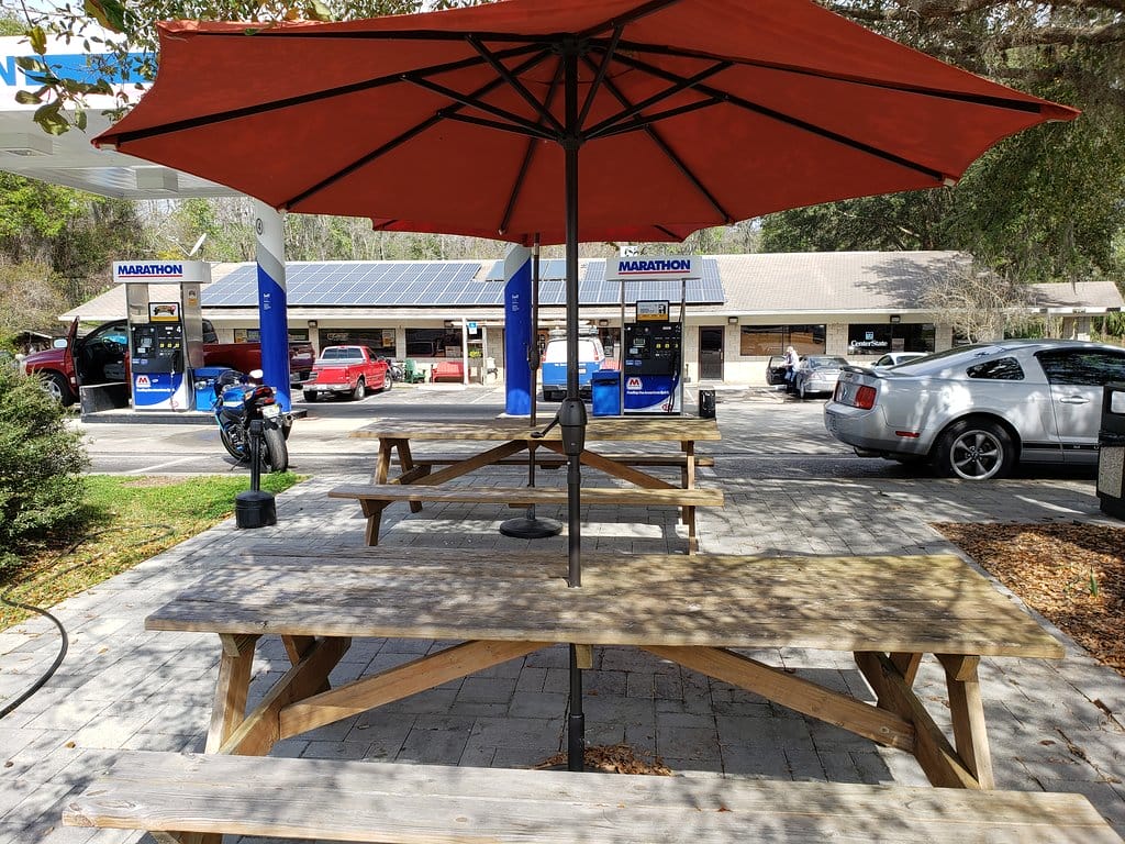 an outdoor dining facing the store