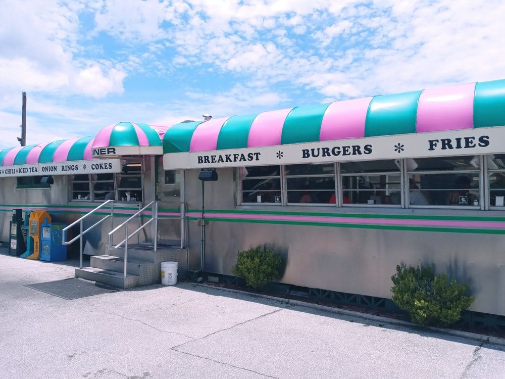 exterior shot of angels diner showing the colorful retro design