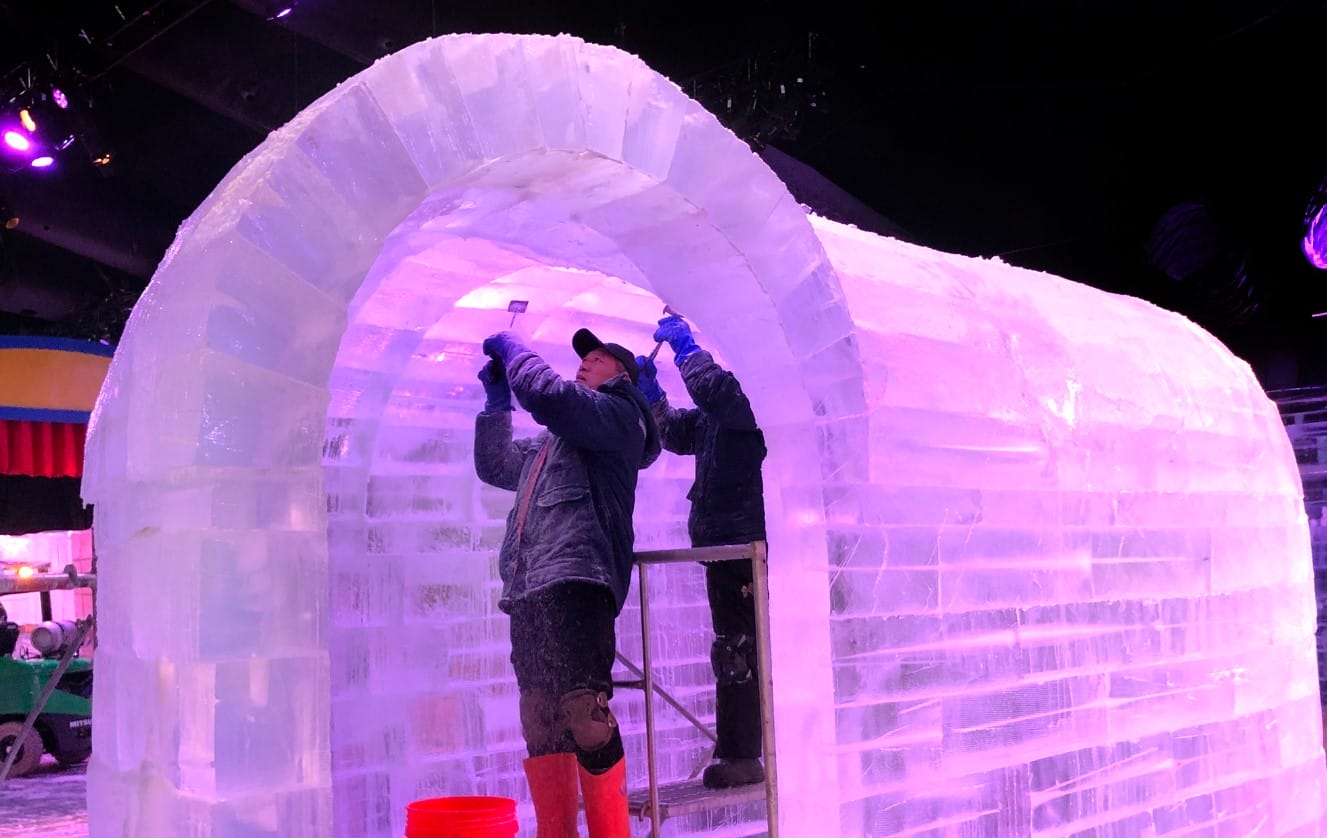 ice sculptors building the exhibits