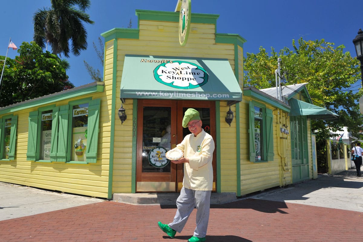 Kermit Carpenter in front of his shop