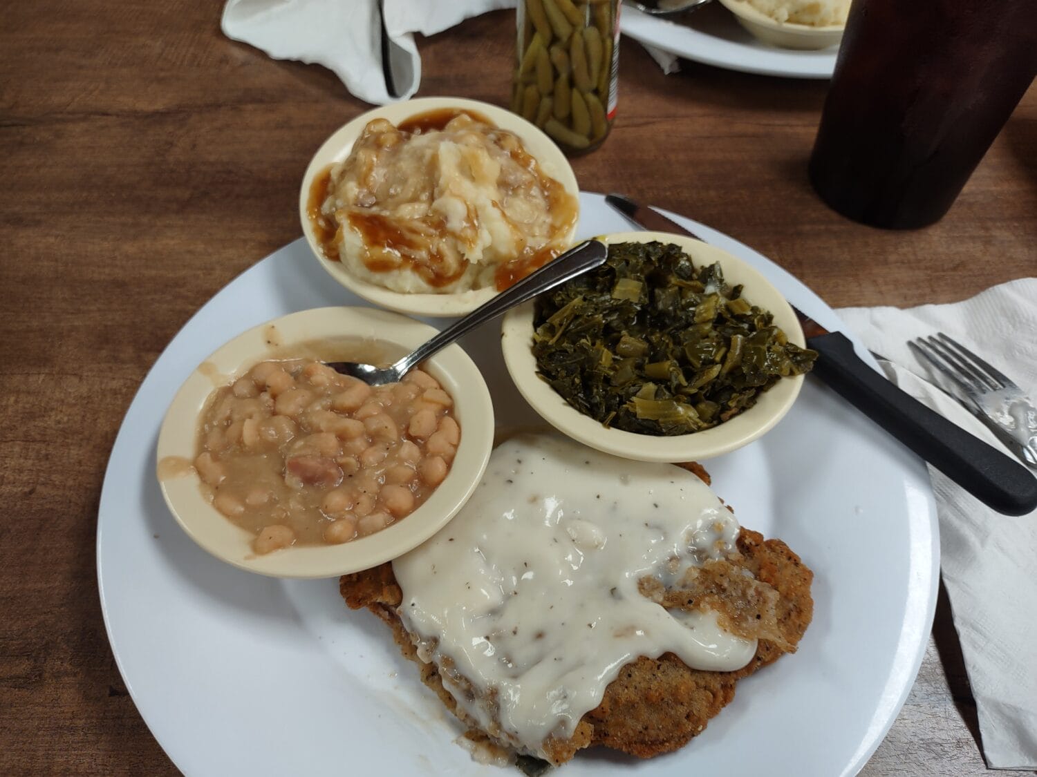 Perfectly cooked chicken fried steak with delicious sides