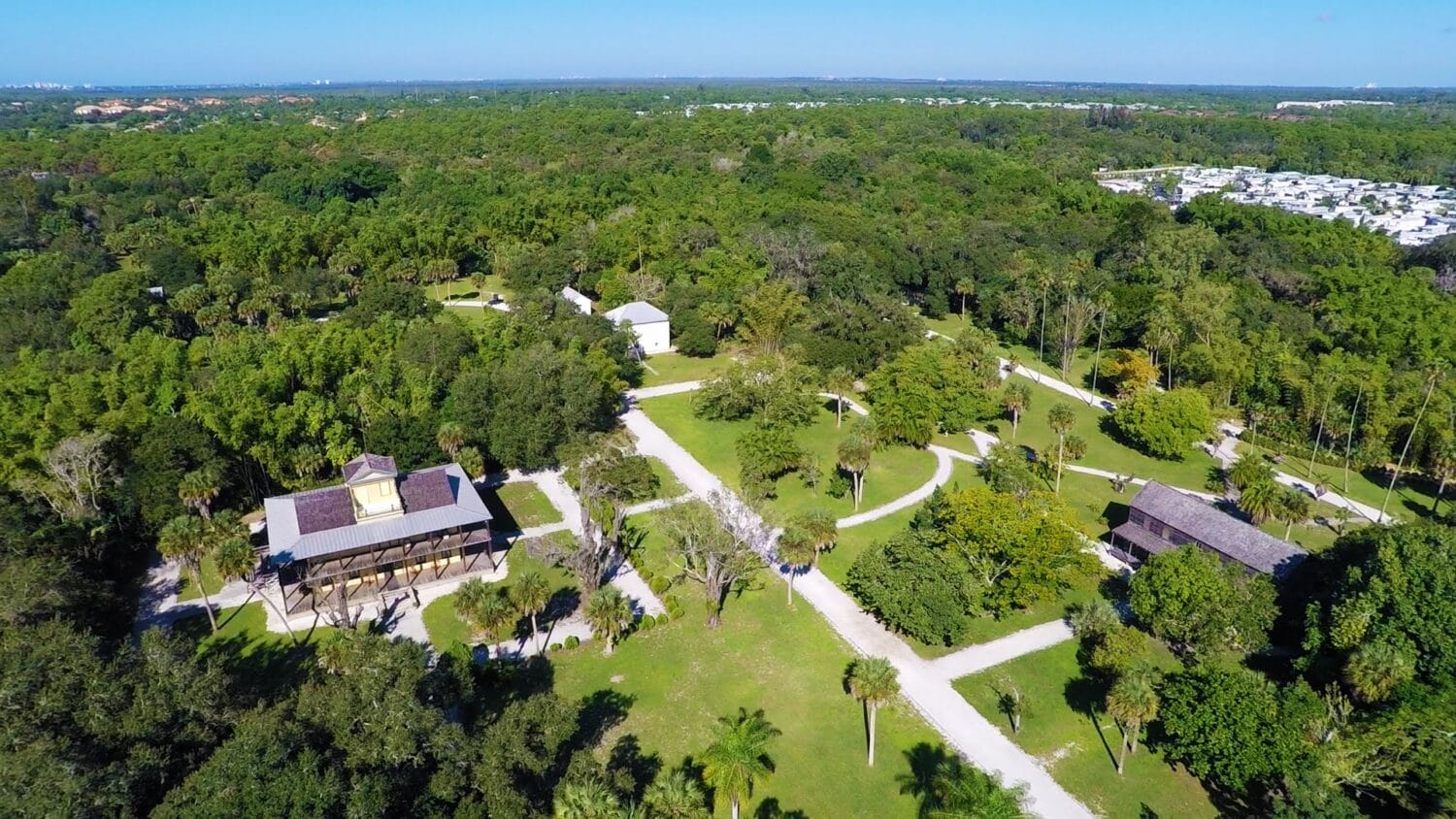 The aerial view of the Koreshan state park surrounded by the most majestic oak trees.
