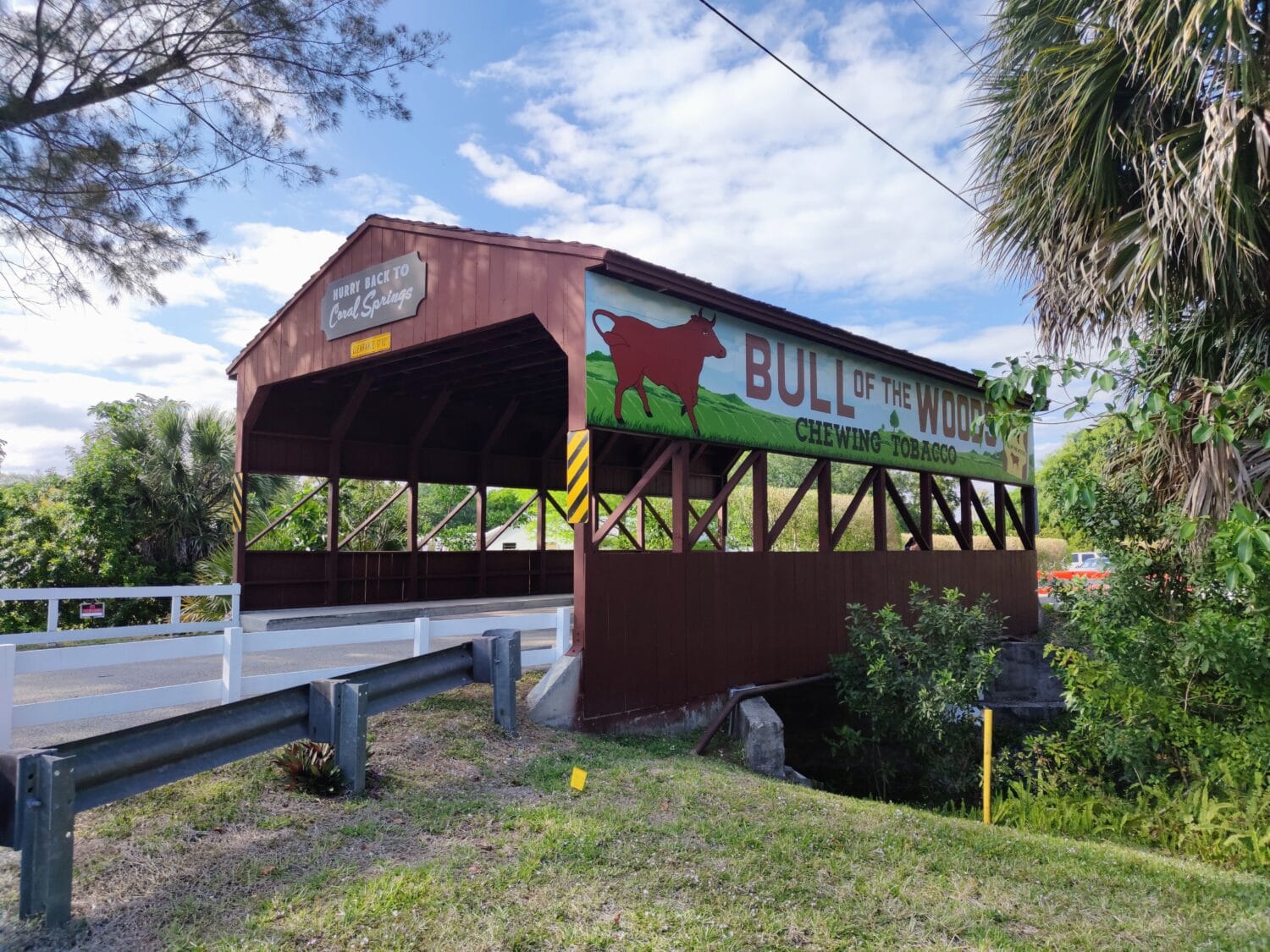 the covered bridge in painted in bright red