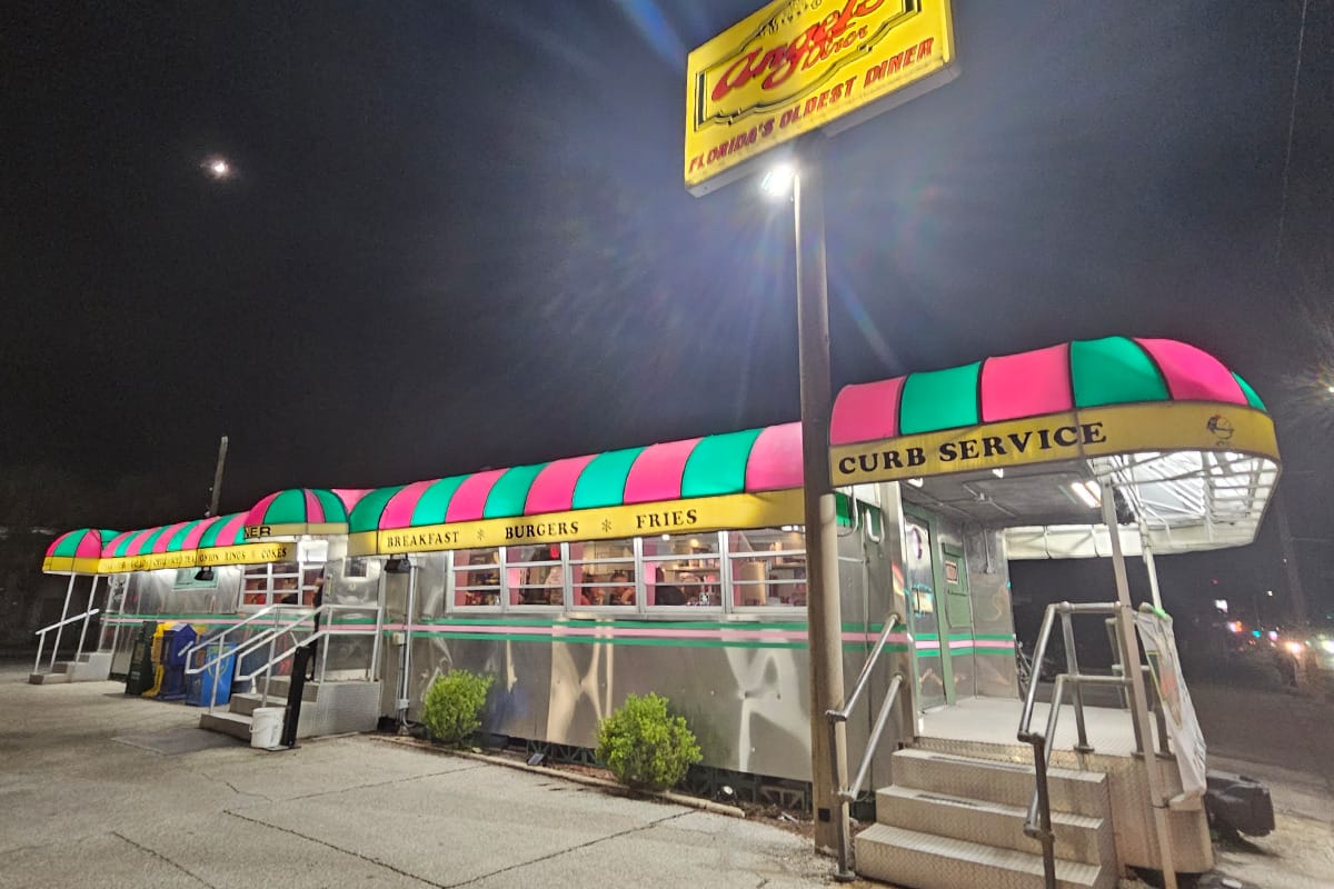 The diner at night with its vibrant exterior.