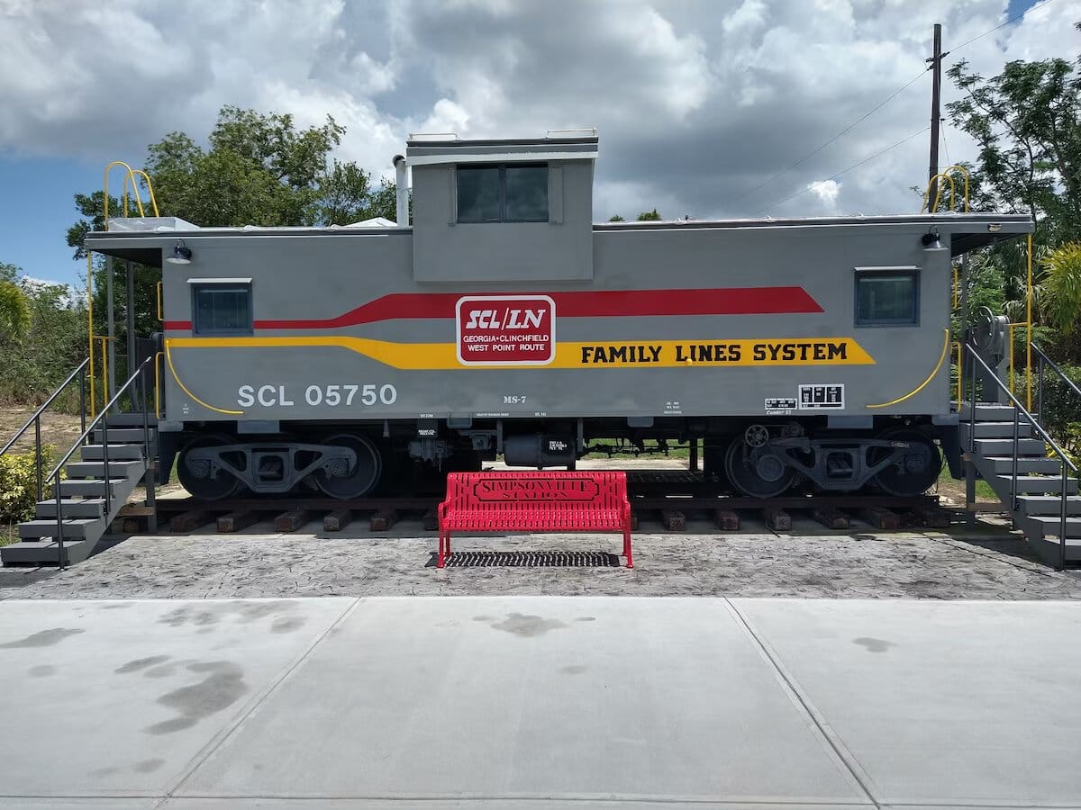 The front of the caboose with a red bench