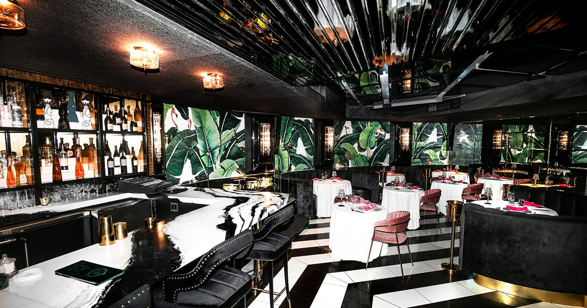 the sleek interior of cash only supper club