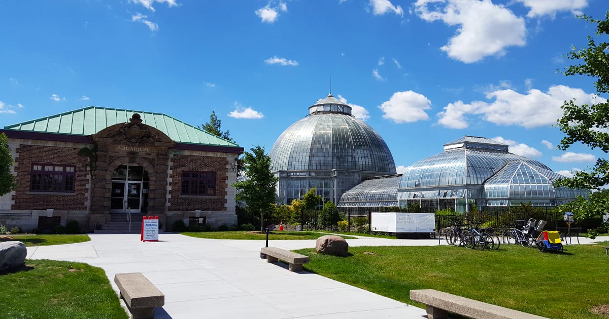 the historic building of belle isle aquarium and adjacent conservatory with a grand glass dome structures