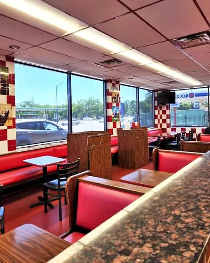 Inside Monroe's, where nostalgia lines the walls and the "Hire a Teenager" sign reminds us some jokes, like their recipes, age beautifully.