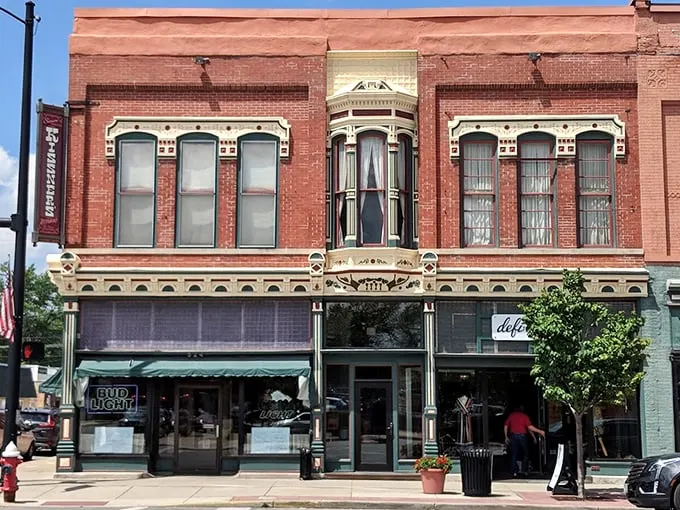 Step into a time machine! Kissner's brick facade whispers tales of bygone eras, while its ornate bay window winks at passersby, promising delicious secrets within.