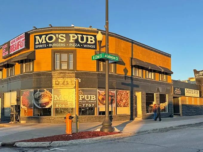 A beacon of culinary delight, Mo's Pub stands proudly on the corner, its vibrant exterior promising unforgettable flavors within.