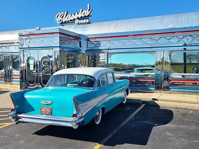 Time-travel never looked so delicious! This gleaming silver diner, complete with a classic Chevy, promises a journey back to the fabulous '50s.