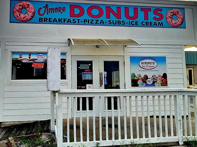 A donut shop that's more than meets the eye. This unassuming exterior hides a world of culinary delights waiting to be discovered.