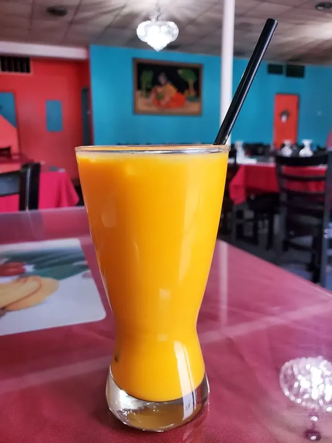 Liquid gold in a glass! This mango juice is so fresh, you'll swear you're sipping straight from a tropical paradise.
