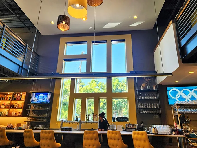 At this bar, the only thing higher than the ceiling are the spirits—both in bottles and in patrons!