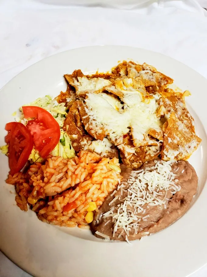 A fiesta for your taste buds! Crispy tortillas bathed in zesty sauce, topped with eggs and cheese – it's how mornings were meant to begin.
