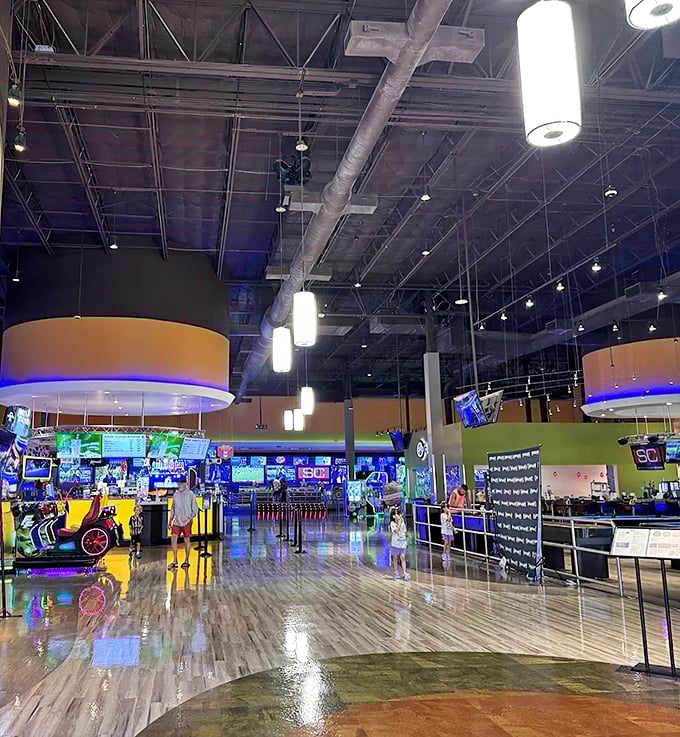 Step into a kaleidoscope of joy! This dazzling entrance is like Willy Wonka's factory but with more bowling and less chocolate river. Photo credit: Harley Larz