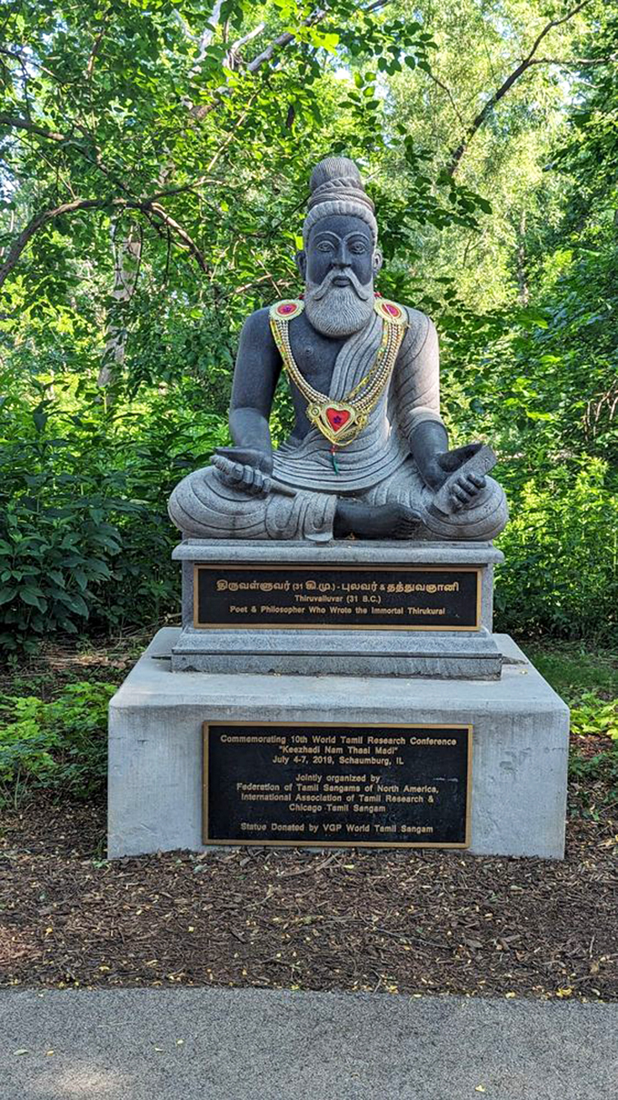 The ancient Tamil poet sits in serene meditation, bringing centuries of wisdom to this corner of suburban Chicago.