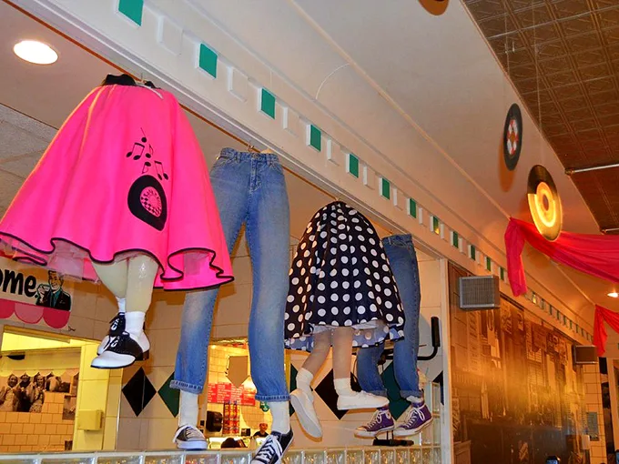 Look up! Mannequins in colorful garb add a slice of whimsy to your sweet escape.