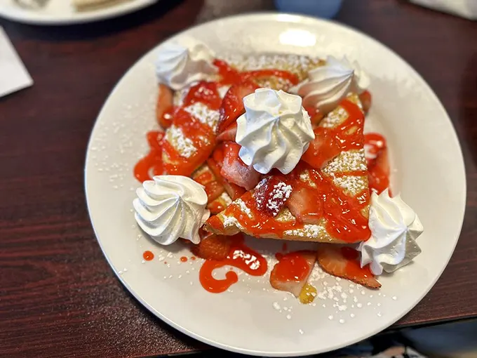 Golden, fluffy, and sweet enough to make your dentist wince. This French toast isn't just breakfast—it's a warm, syrupy hug for your taste buds.